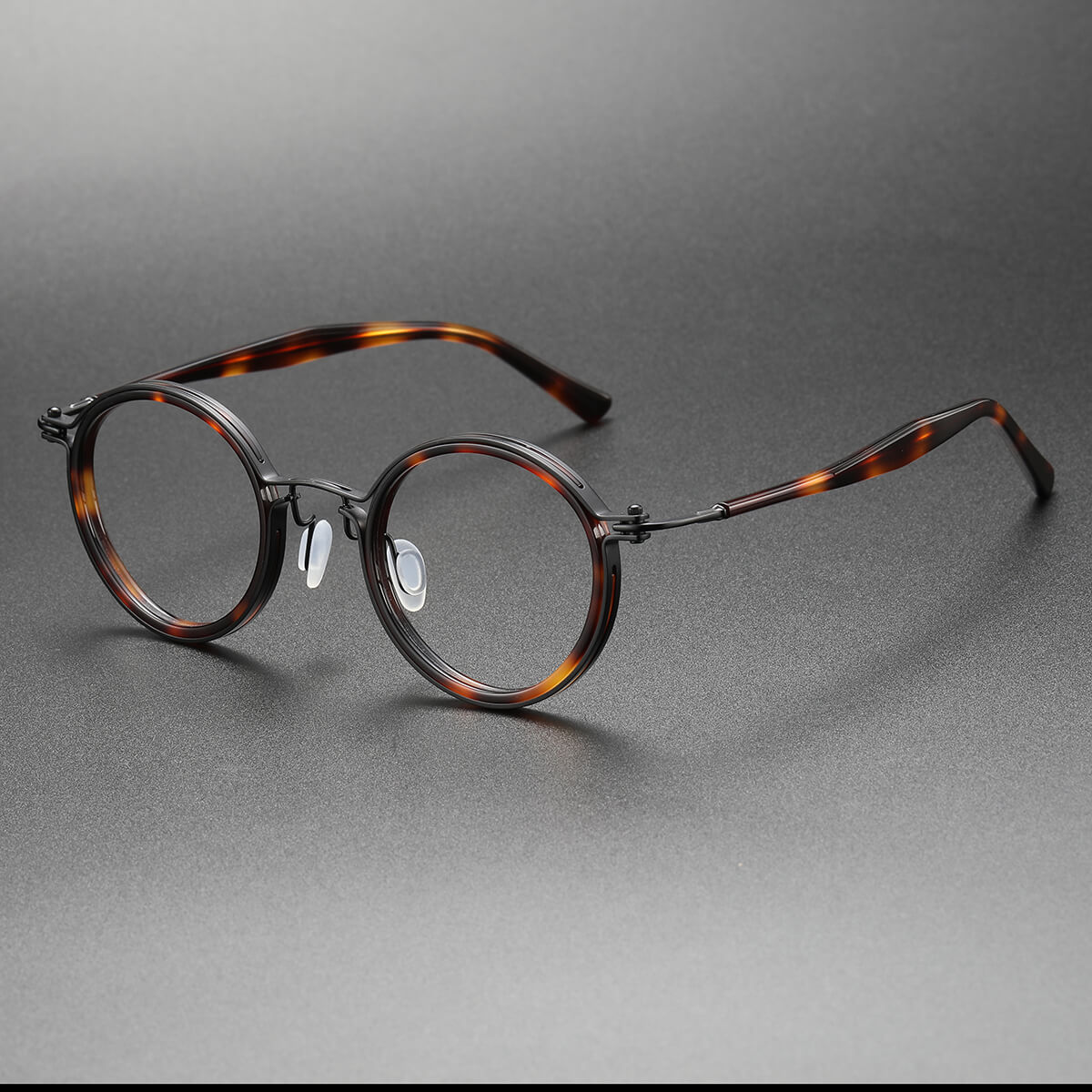 Round Tortoise Shell Glasses LE0449 - Black Titanium Rim Design